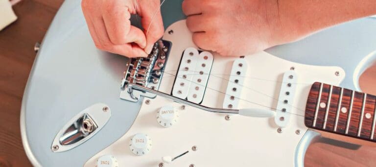 Why Are Your Strings Buzzing After Restringing? – Rock Guitar Universe